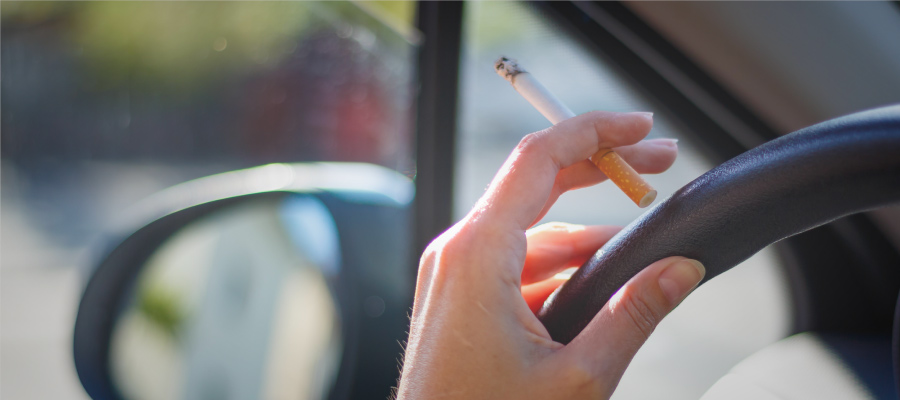 Posso ser multado por fumar a conduzir em Portugal? - Grupo Filinto Mota